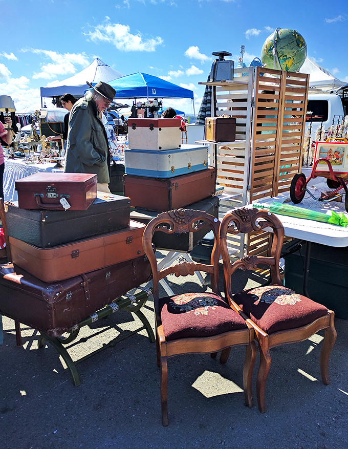 Stacked vintage luggage that's seen more of the world than most travel influencers&mdash;each scratch tells a story of adventures long past.