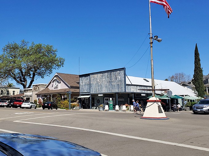 The classic American flagpole anchoring Main Street gives such Norman Rockwell vibes that you'll swear you can hear apple pies cooling on windowsills.