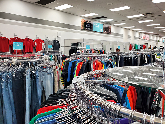 Men's clothing section: where Hawaiian shirts and business attire coexist in peaceful harmony. Dad's next favorite shirt is waiting.