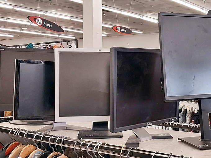 Computer monitors await their next assignment, silent sentinels of the digital revolution now available at analog prices.