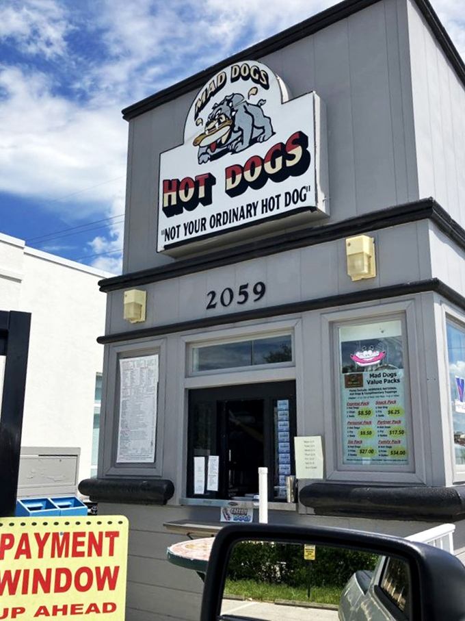 The order window beckons with promise—like the pearly gates, if heaven served gourmet hot dogs and hand-cut fries.