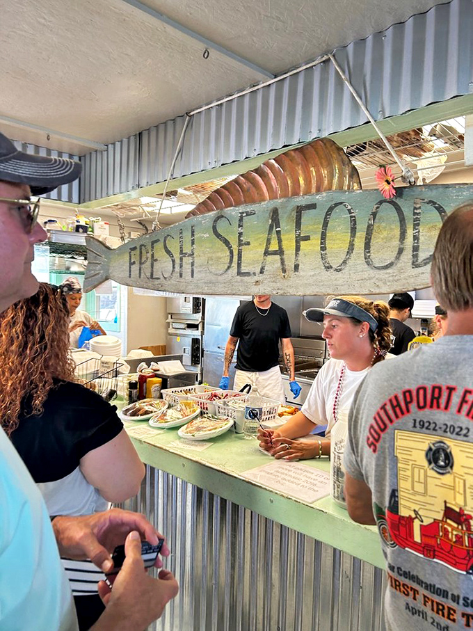 The "FRESH SEAFOOD" sign isn't just decoration &ndash; it's the restaurant's entire philosophy hanging right above your next meal.