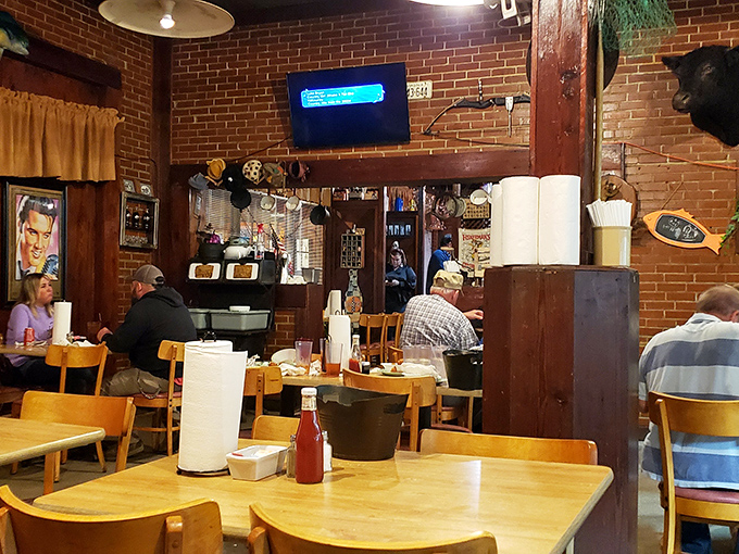 Brick walls, wooden beams, and paper towel rolls on every table signal you're in for an unpretentious feast.