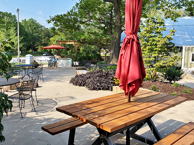 The outdoor dining area offers nature's soundtrack with your meal. Those red umbrellas add just the right pop of color to enhance appetite.