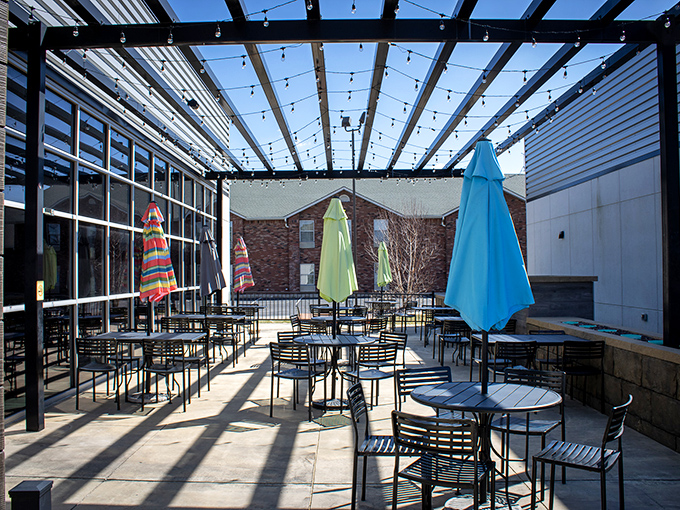 Al fresco dining under string lights adds magic to every meal. Even umbrellas seem happier at El Paraiso's charming outdoor patio.