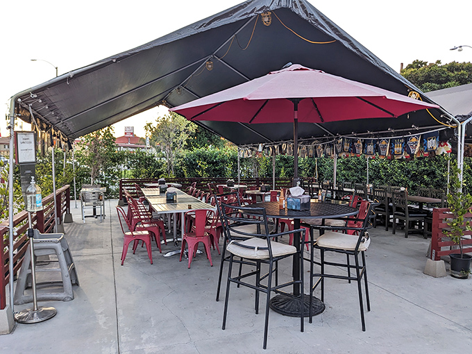 The outdoor dining area offers a breezy alternative for enjoying your Mexican feast. Red umbrellas provide shade while you contemplate ordering seconds.