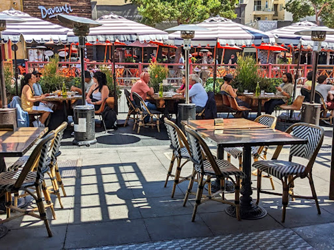 Little Italy's sidewalk dining scene offers the perfect stage for people-watching while savoring treasures from the deep.