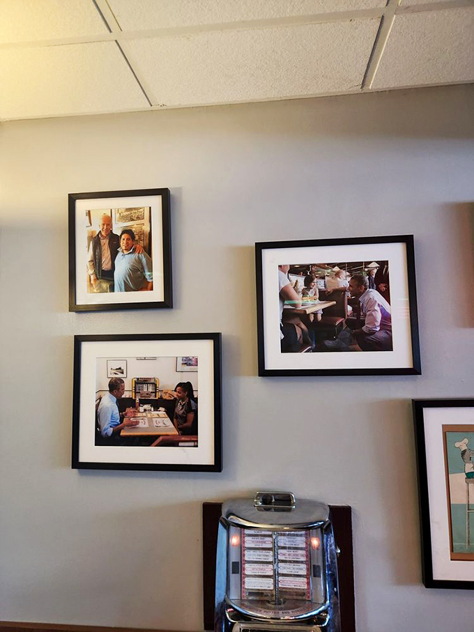 The wall of fame reveals Charcoal Pit isn't just a restaurant but a community landmark, with framed memories and visits from notable guests who succumbed to burger temptation.