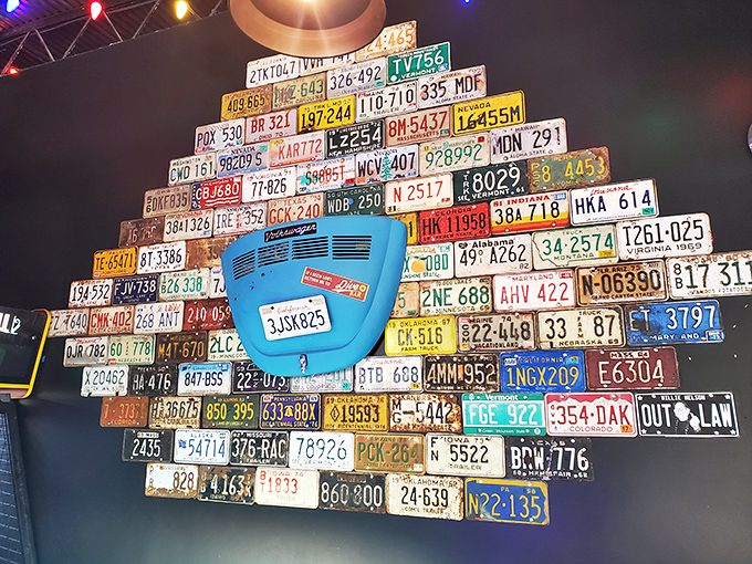 License plate paradise! This automotive art installation creates a conversation piece that'll have you spotting plates from your hometown adventures.