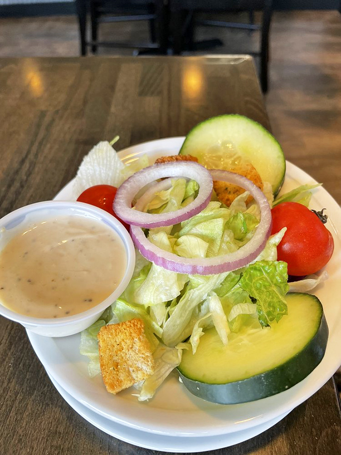 Even their side salad gets the respect it deserves—crisp vegetables, house-made dressing, and not a wilted leaf in sight.