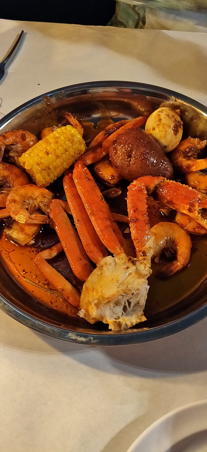 A seafood boil that's part meal, part interactive experience, and entirely worth the bib, wet wipes, and temporary abandonment of table manners.