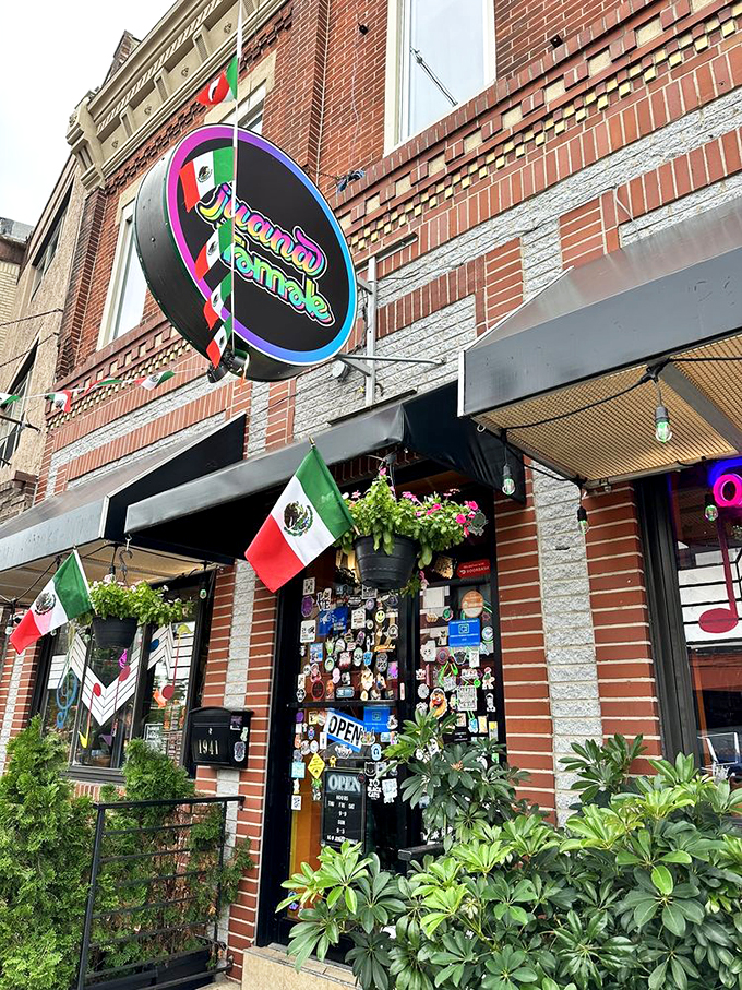 The neon sign cuts through Philly's urban landscape like a beacon for the hungry. Those Mexican flags aren't just decoration &ndash; they're a promise of authenticity.