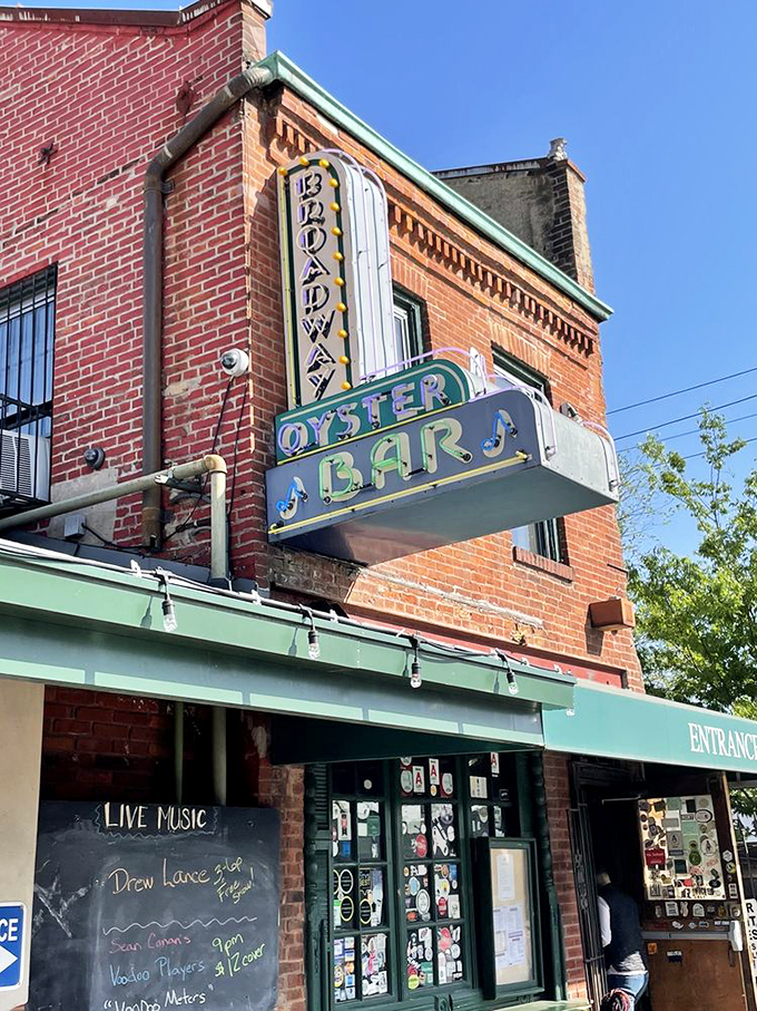 That vertical neon sign doesn't just mark a location; it's a lighthouse guiding hungry souls to seafood salvation.