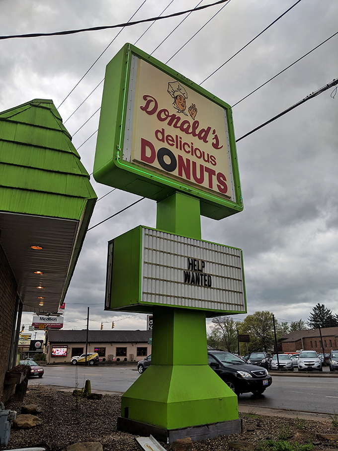 The iconic green sign stands tall against Ohio skies, a beacon of sweetness that's been guiding hungry locals through life's ups and downs.