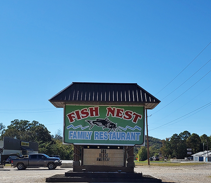 The roadside sign stands like a beacon to hungry travelers. Follow the catfish, friends&mdash;it knows where you need to go.