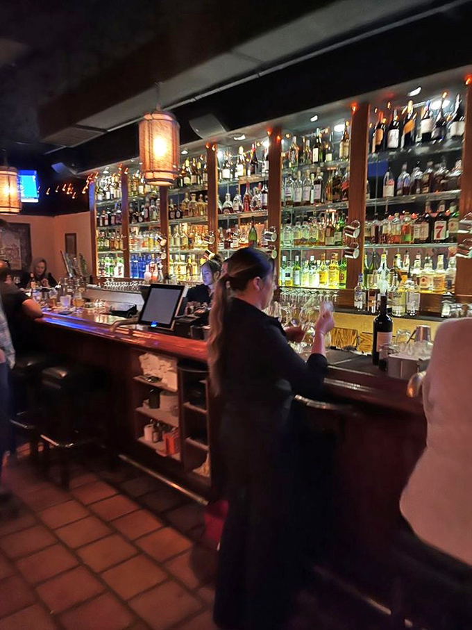 Behind that impressive bar stands a collection that would make any spirits enthusiast weak in the knees. Decisions, decisions.