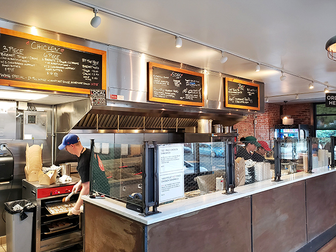 Behind the scenes where the magic happens—chefs transforming humble ingredients into crispy, juicy masterpieces of American cuisine.