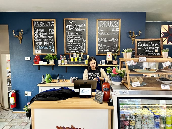 Behind every great meal is a team that makes the magic happen. The blue wall of menus serves as mission control for this seafood operation.