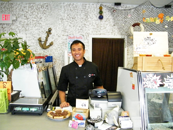 Behind every great seafood feast is someone who knows their way around the ocean's bounty. The smile says it all.