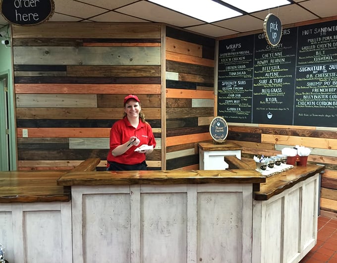 The ordering counter&mdash;where dreams and hunger meet. Friendly staff ready to guide you through a menu of temptations.