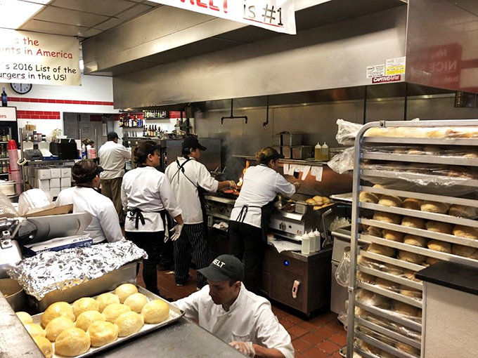 The kitchen crew moves with the precision of NASA engineers, except their mission is sending flavor to your mouth instead of rockets to space.