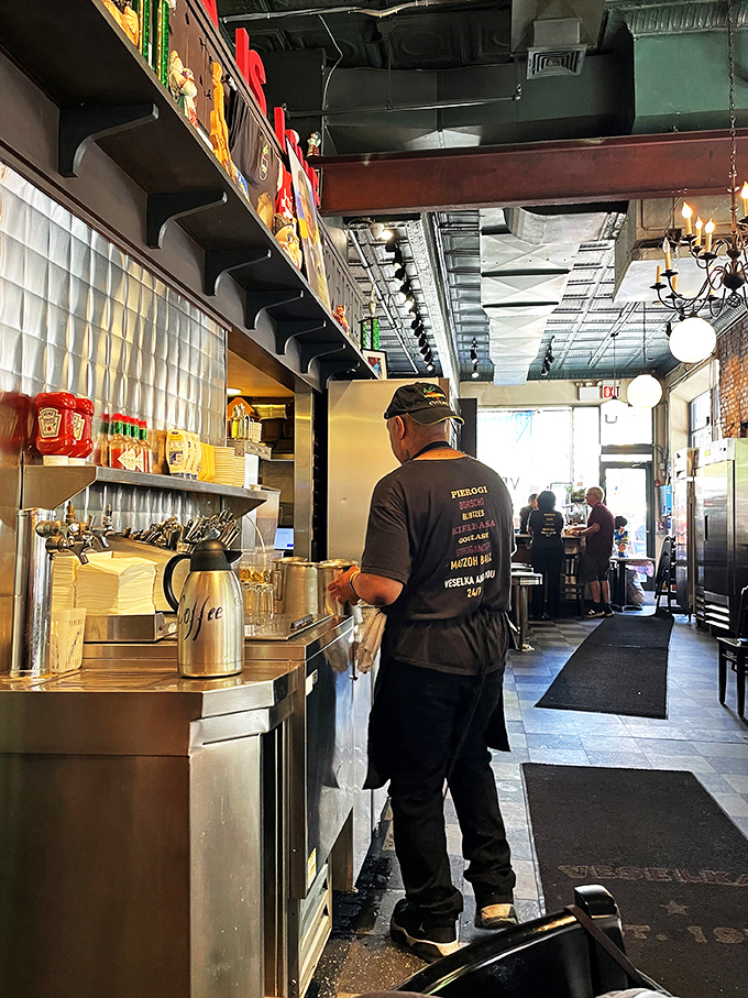 Behind every great restaurant stands dedicated staff, moving with practiced efficiency in a space where coffee is always brewing and orders keep flowing.