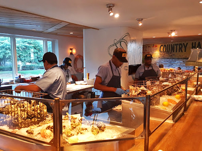 The dining room after dark becomes an intimate theater where seafood takes center stage and Edison bulbs cast everyone in their best light.