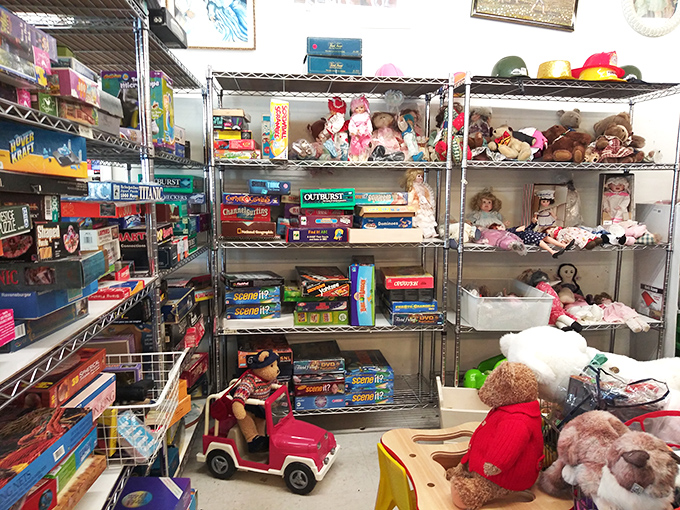 Board games and teddy bears wait patiently for new playmates. Monopoly still destroying families since 1935, now at a fraction of the price.