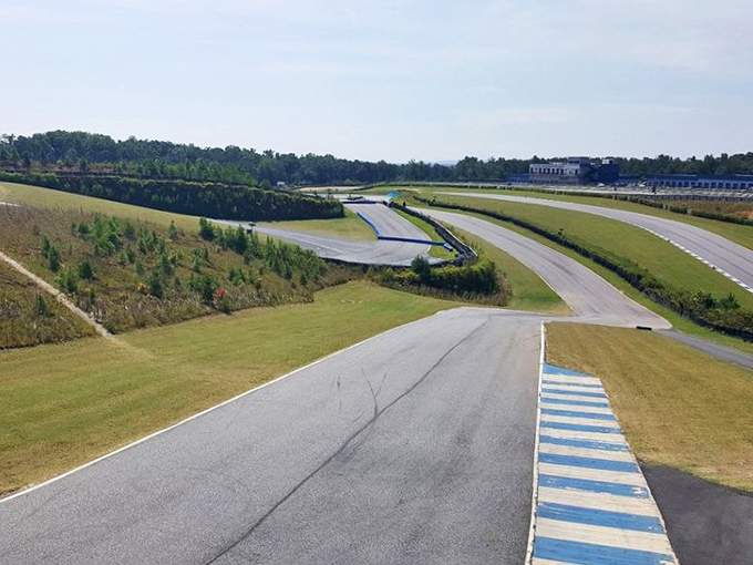 Nature meets motorsport in perfect harmony. Those elevation changes aren't just pretty – they're engineering challenges waiting to be conquered.