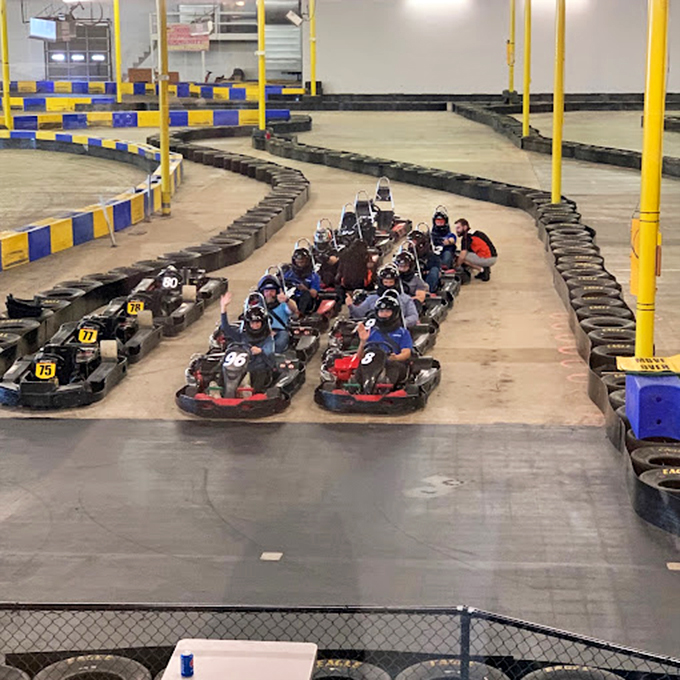 The pre-race huddle, where strategies are formed and friendly trash talk begins. "May the best driver win" really means "I'm coming for you."