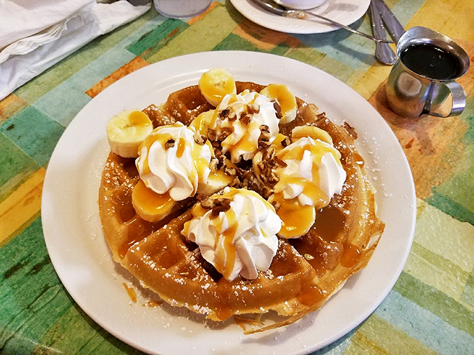 This isn't just a waffle&mdash;it's a throne for whipped cream, bananas, and pecans to hold court over your breakfast expectations.