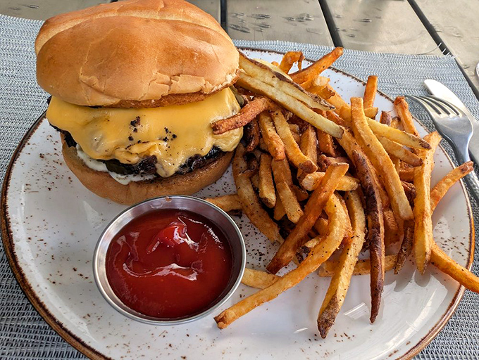 The burger that ruins all other burgers for you—paired with fries so perfect they deserve their own fan club.