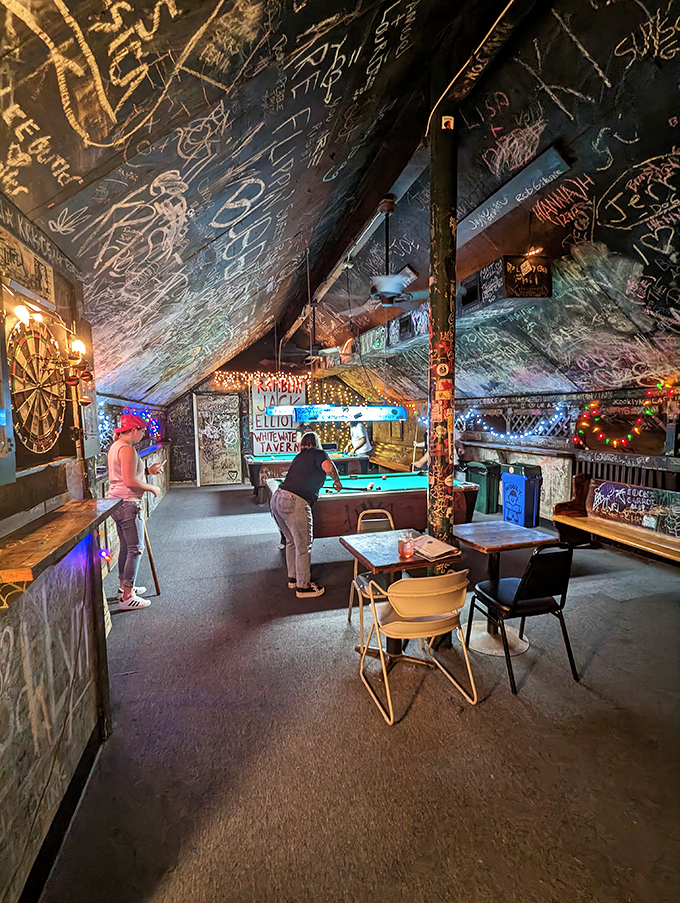 The pool table stands ready for games where the rules are flexible and the stories about "that one shot" grow taller with each beer.