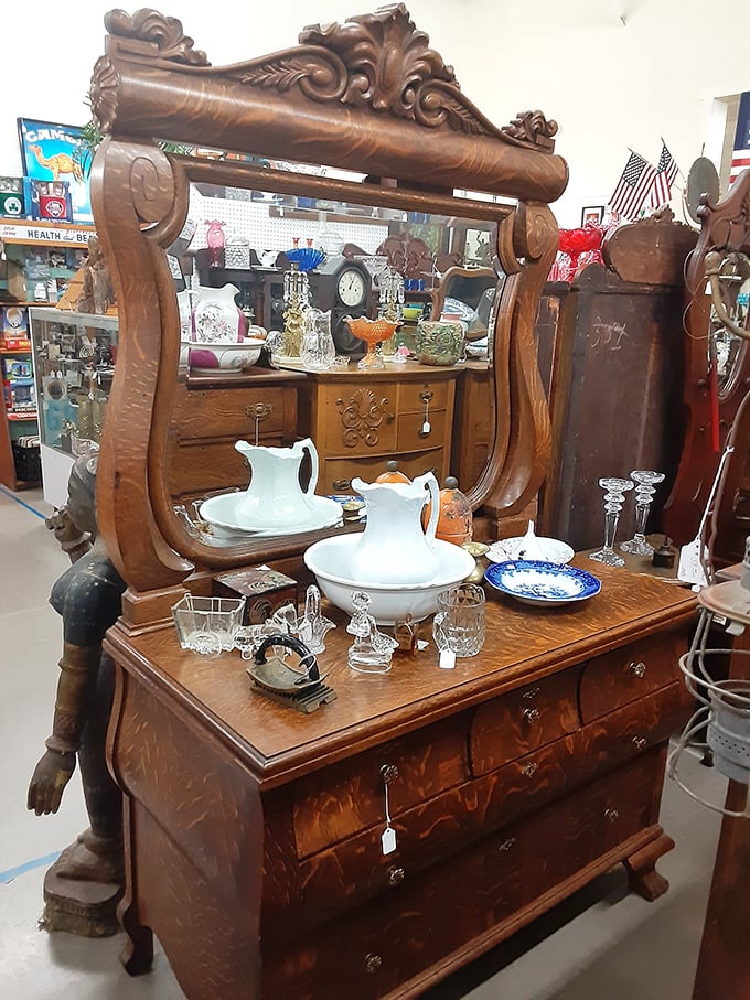 This isn't just a dresser with mirror&mdash;it's Victorian drama in oak form. Those white porcelain washbasins have stories that would make you blush.