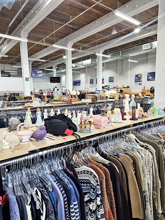 Figurines and teapots create a whimsical still life above racks of sweaters. Marie Kondo would have a panic attack, but treasure hunters feel right at home.
