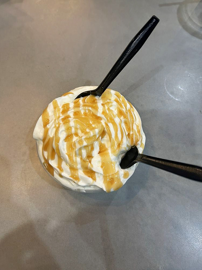 Banana pudding with caramel drizzle&mdash;because after a barbecue feast, you deserve dessert that doesn't know the meaning of restraint.