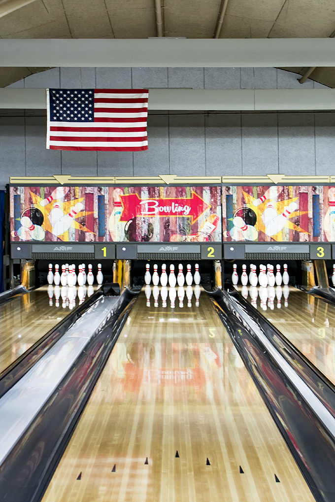 The American flag hangs proudly above perfectly arranged pins&mdash;a Norman Rockwell painting come to life in this heartland bowling sanctuary.