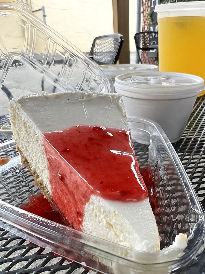 This cheesecake with its glistening strawberry topping isn't just dessert; it's the grand finale your taste buds have been waiting for.