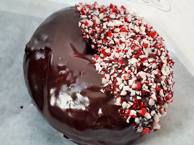 Half-dipped in chocolate with a festive peppermint confetti edge&mdash;this donut doesn't just celebrate the holidays, it IS the holiday.
