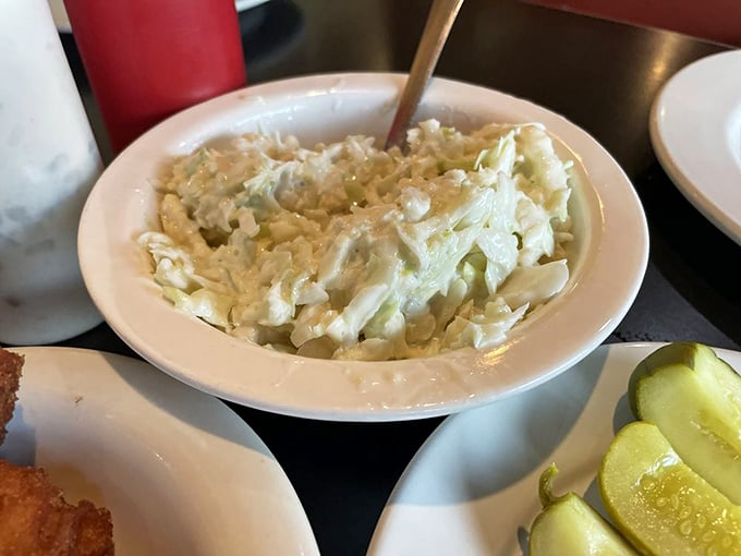 Creamy coleslaw that doesn't know it's a supporting character&mdash;fresh, crisp, and ready to cool down your palate.