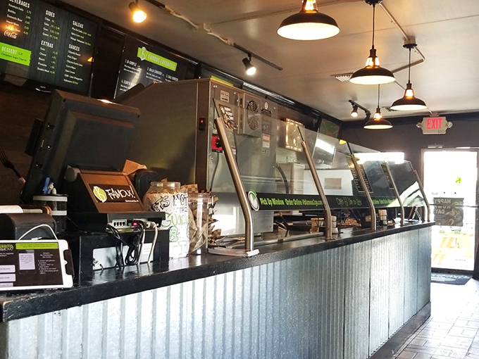 The assembly line of possibility&mdash;where dreams become burritos and hunger transforms into anticipation behind that corrugated metal counter.