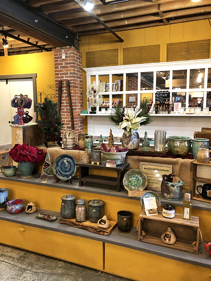 Pottery meets exposed brick in a store display that makes you want to redecorate your house with river-inspired ceramics immediately.