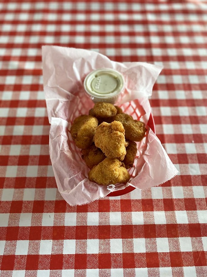 Golden-fried cauliflower bites that could convert even the most dedicated vegetable skeptic. That dipping sauce isn't just an afterthought&mdash;it's an essential flavor companion.