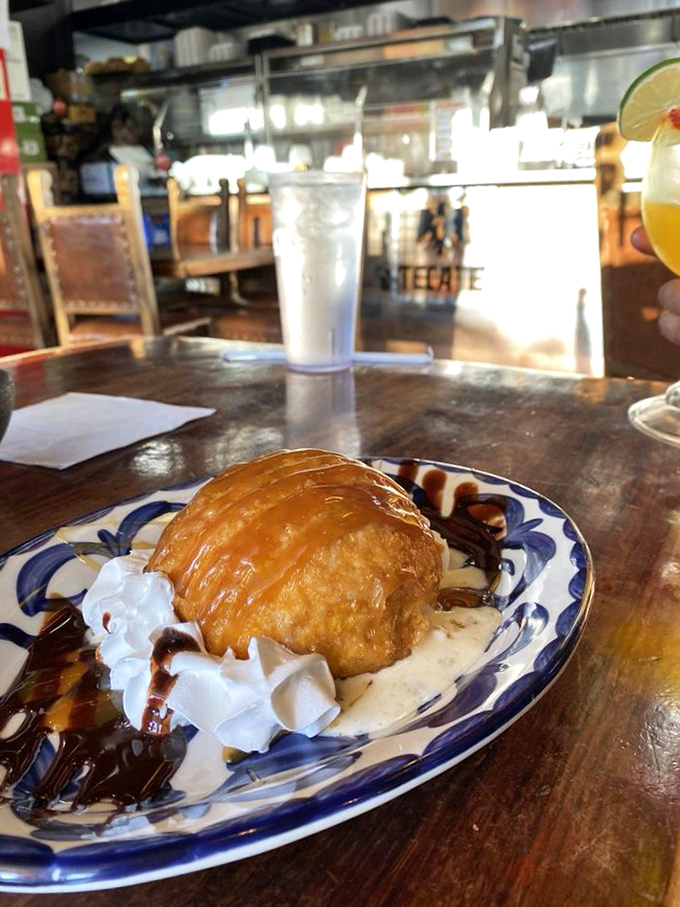 Fried ice cream: the dessert equivalent of business in front, party in back. Crispy shell, melting vanilla, chocolate drizzle&mdash;a textural masterpiece.