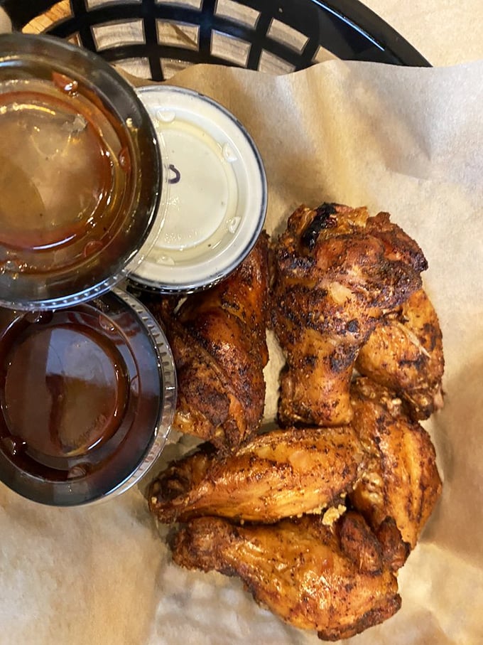 Wings that have clearly gone through smoke therapy &ndash; crisp-skinned, spice-rubbed, and ready for their close-up.
