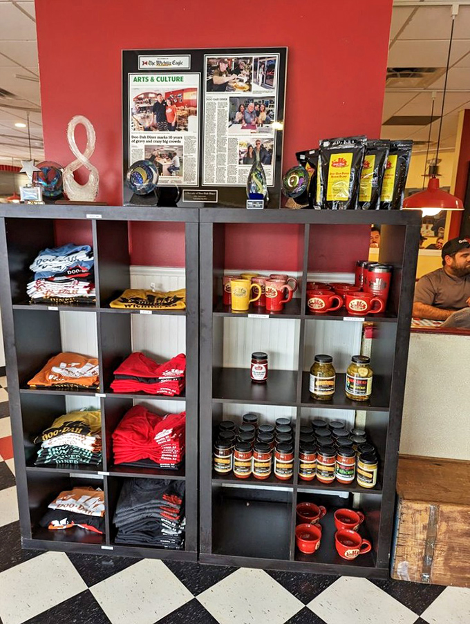 The merch corner: where you can take home a taste of Doo-Dah. That wall of sauces is basically a shrine to flavor.