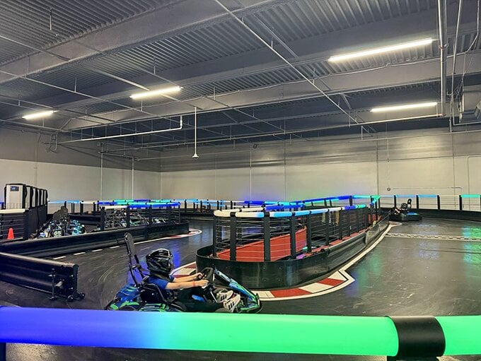 Future racing champions grip their steering wheels with determination, their helmets unable to hide the pure joy of controlled chaos.