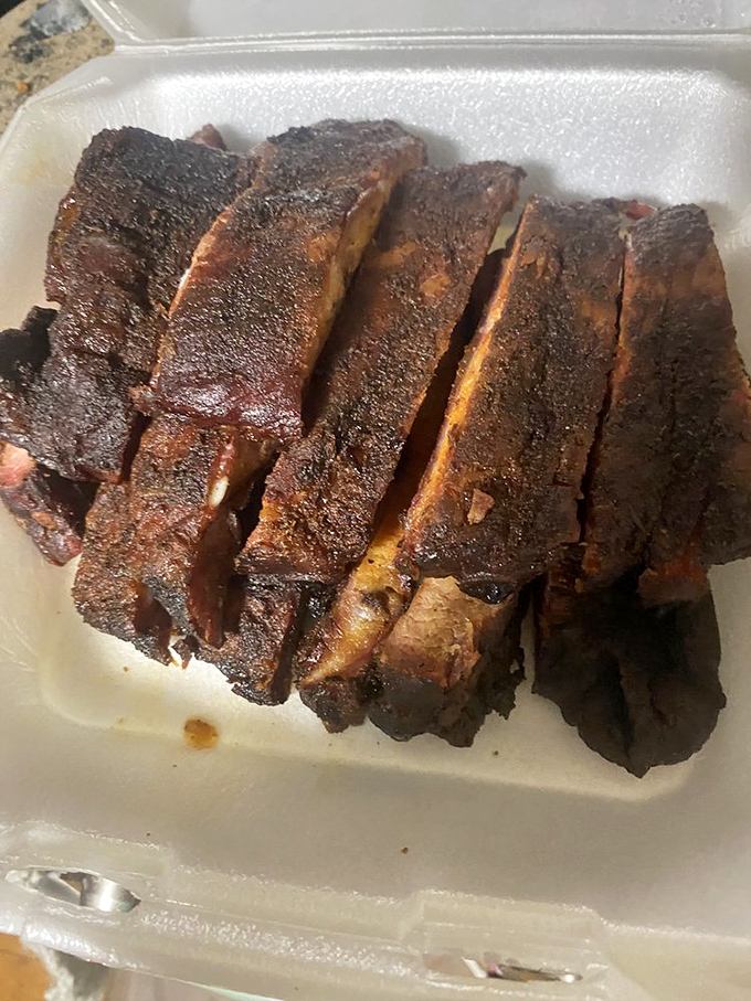 These ribs have spent so much time in the smoker, they've practically earned tenure. The perfect marriage of smoke, meat, and patience.