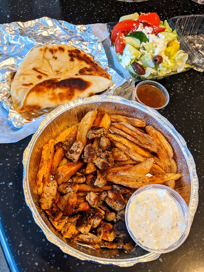 The souvlaki plate is what happens when meat and potatoes decide to study abroad in Greece and come back worldly and delicious.