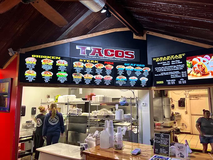 Where taco magic happens! The expansive menu board looms above like the scoreboard at a delicious sporting event.